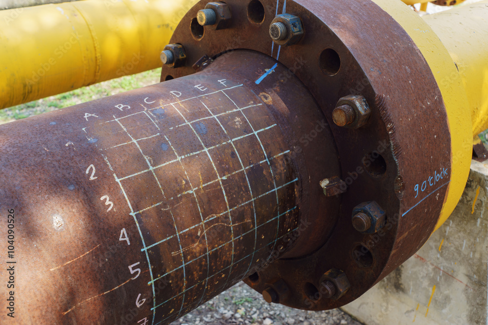 Piping inspection / preparing grid for gauging thickness on rust Stock ...