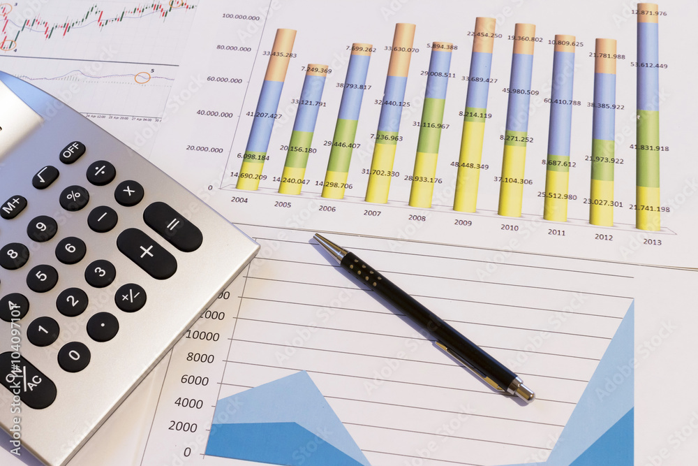 An office desk with charts and histograms graphical documents Stock ...