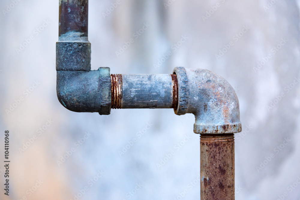 Old water piping system to a house Stock Photo | Adobe Stock