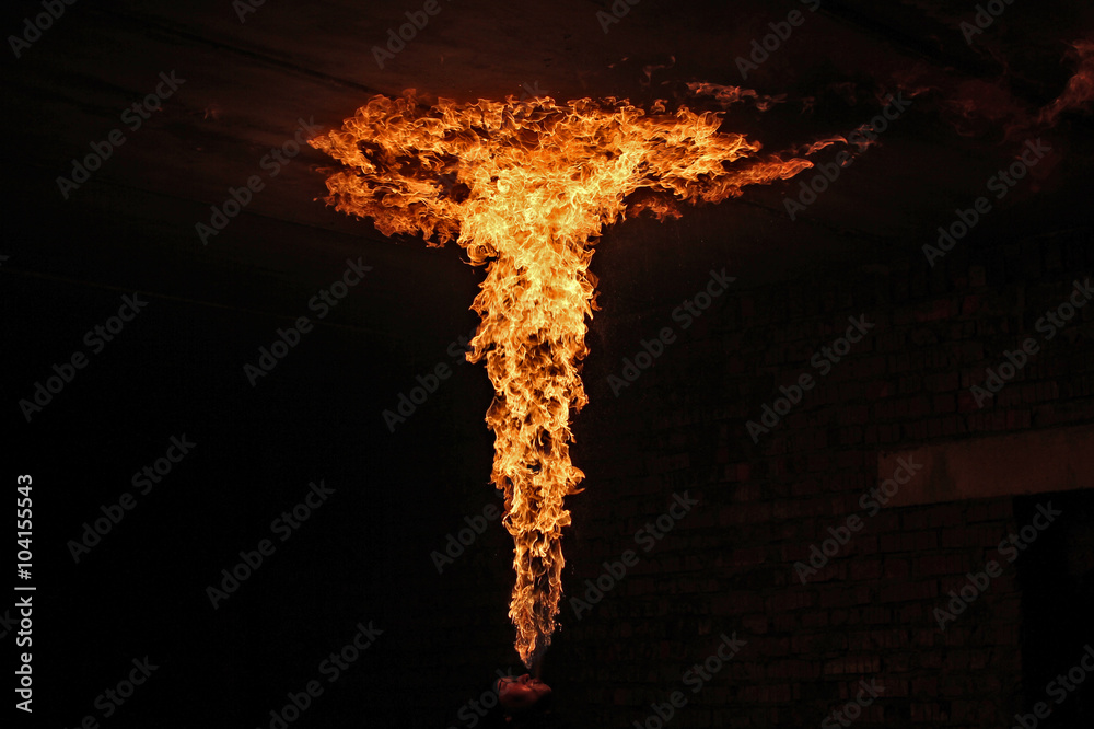 Fire artist performing fire breathing Stock Photo | Adobe Stock