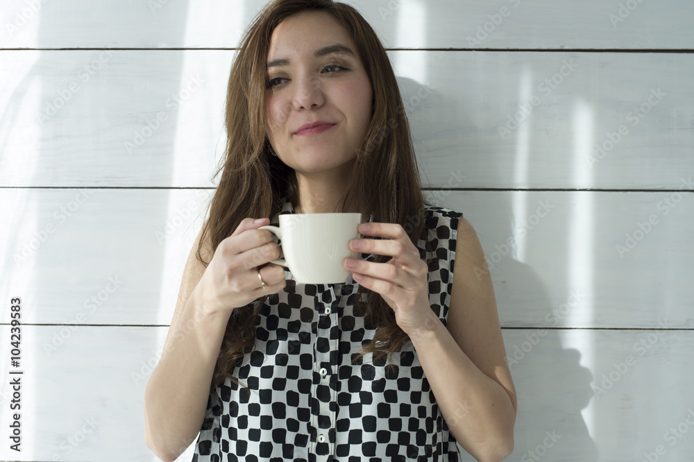 Young women are drinking hot milk Stock Photo | Adobe Stock