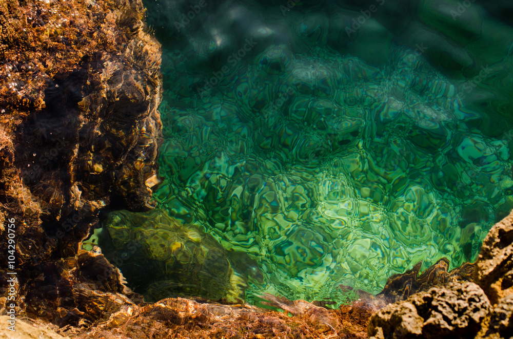 Rocky seabed under water with emerald seawater. Polignano a Mare Stock ...