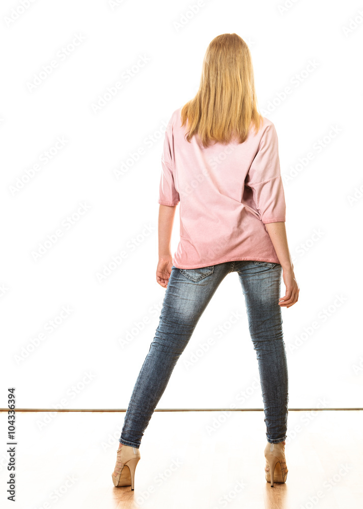 woman in denim pants high heels shoes back view Stock Photo | Adobe Stock