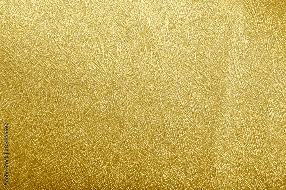 Golden paper foil on background texture. Stock Photo | Adobe Stock