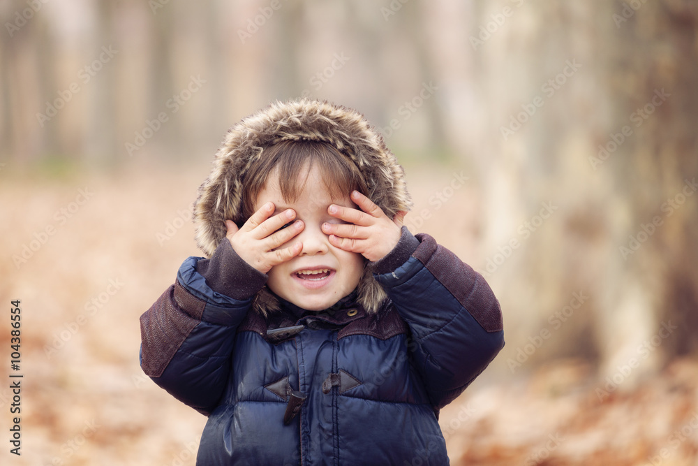 Funny boy, hooded jacket, see no evil Stock Photo | Adobe Stock