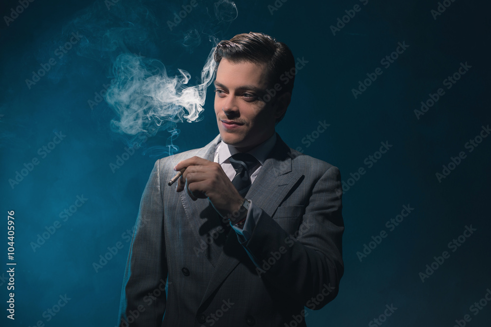 Vintage 1940s business man in suit and tie smoking cigarette aga Stock ...