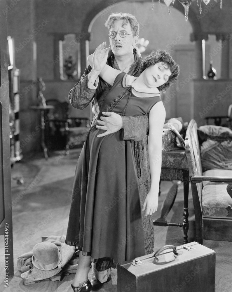 Photo & Art Print Frightened man supporting fainting woman, everettovrk