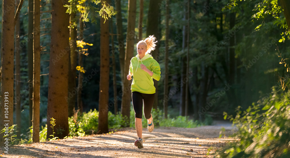 Pretty young girl runner in the forest. Running woman. Female Runner ...