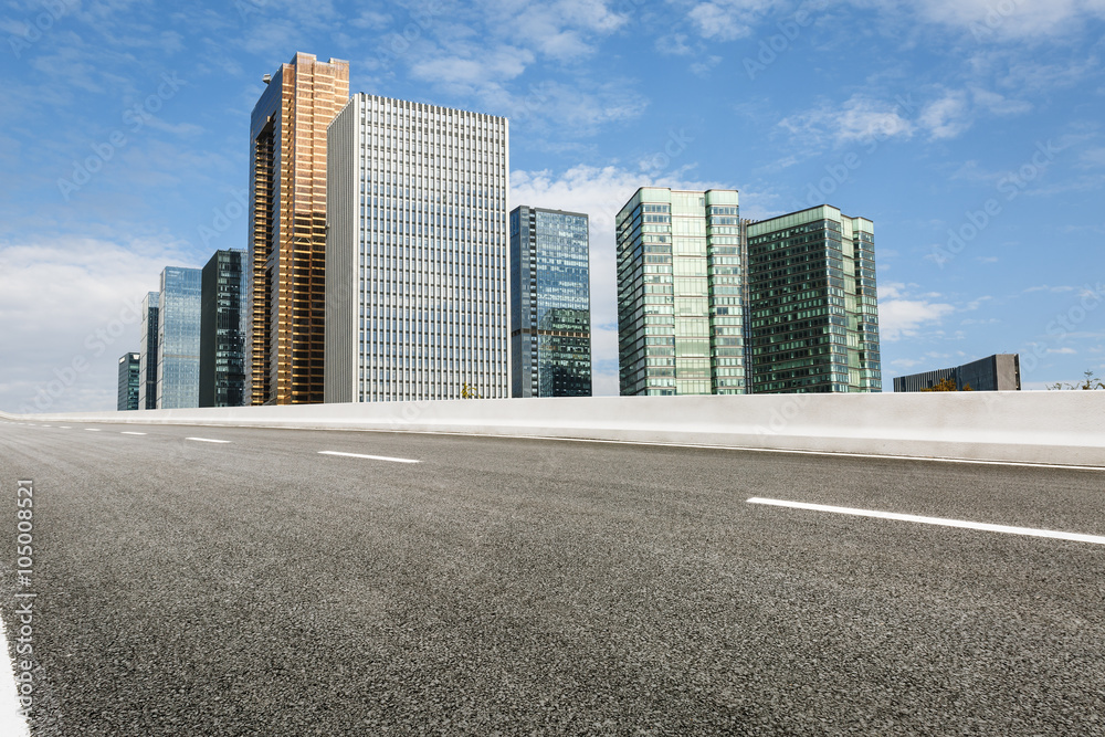 The modern urban commercial building and asphalt road Stock Photo ...