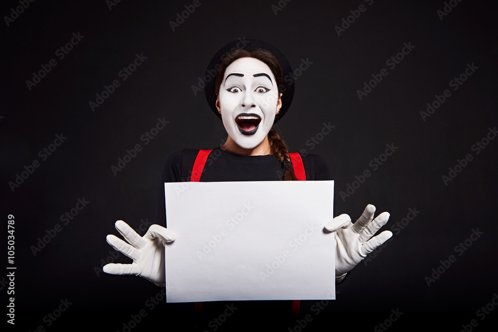 Smiling female mime holding white sheet of paper/ Crazy smiling girl ...