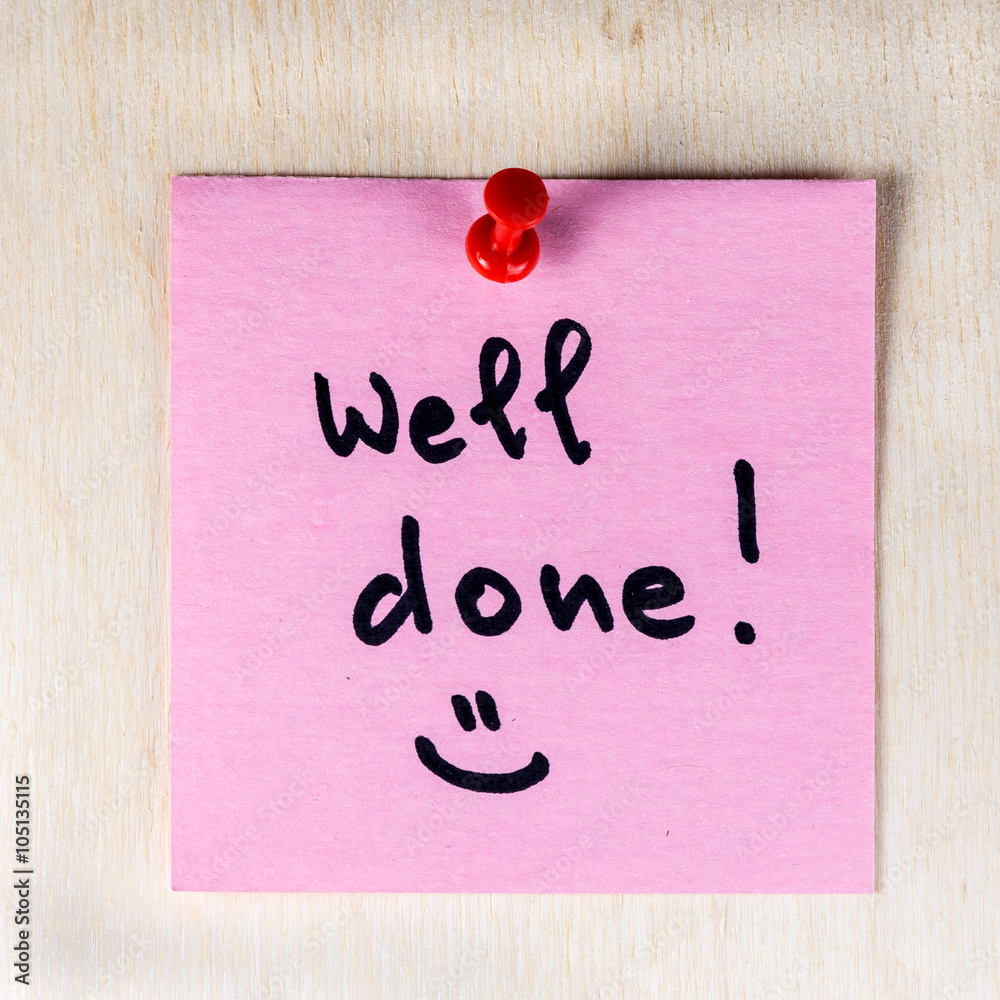 Well done note on paper post it pinned to a wooden board Stock Photo ...