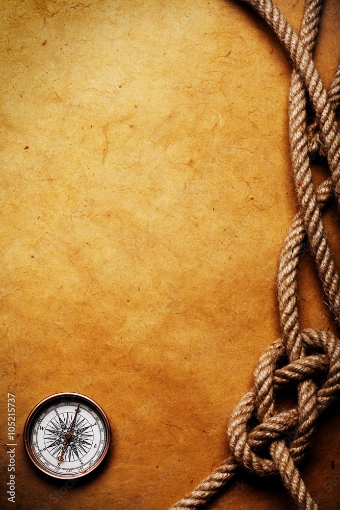 Rope and compass on the old paper background Stock Photo | Adobe Stock