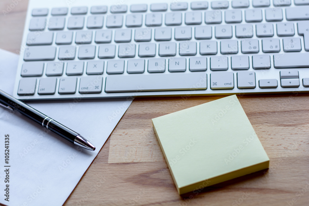 Office desk with keyboard, pen and paper Stock Photo | Adobe Stock