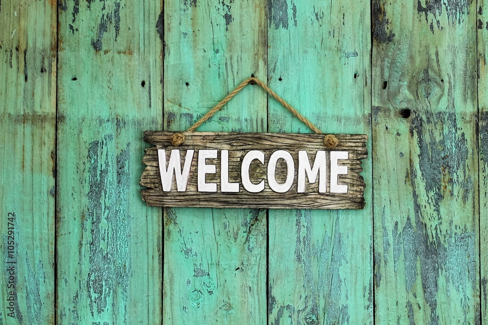 Welcome sign hanging on antique rustic mint green wood background Stock ...