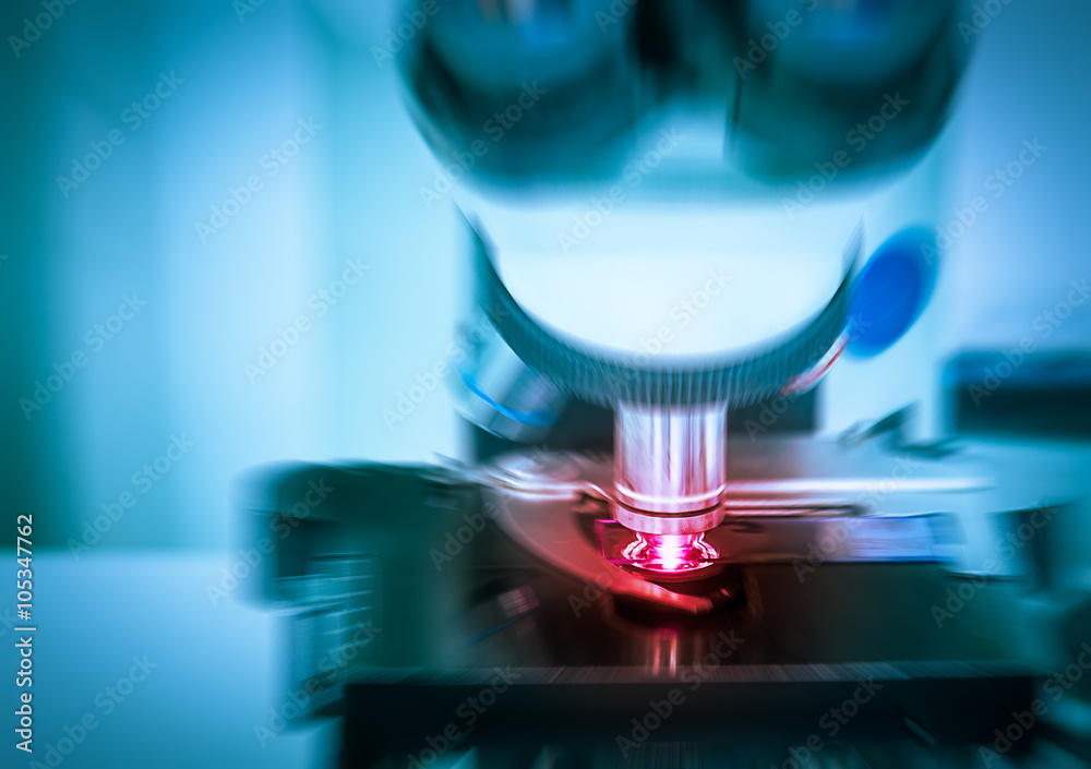 blue blur background and red ray use microscope for find micros Stock ...