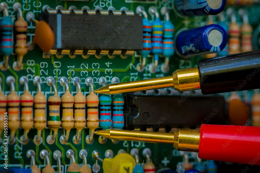 Multimeter,Resistor s, electronic,Multimet er probes examining a ...