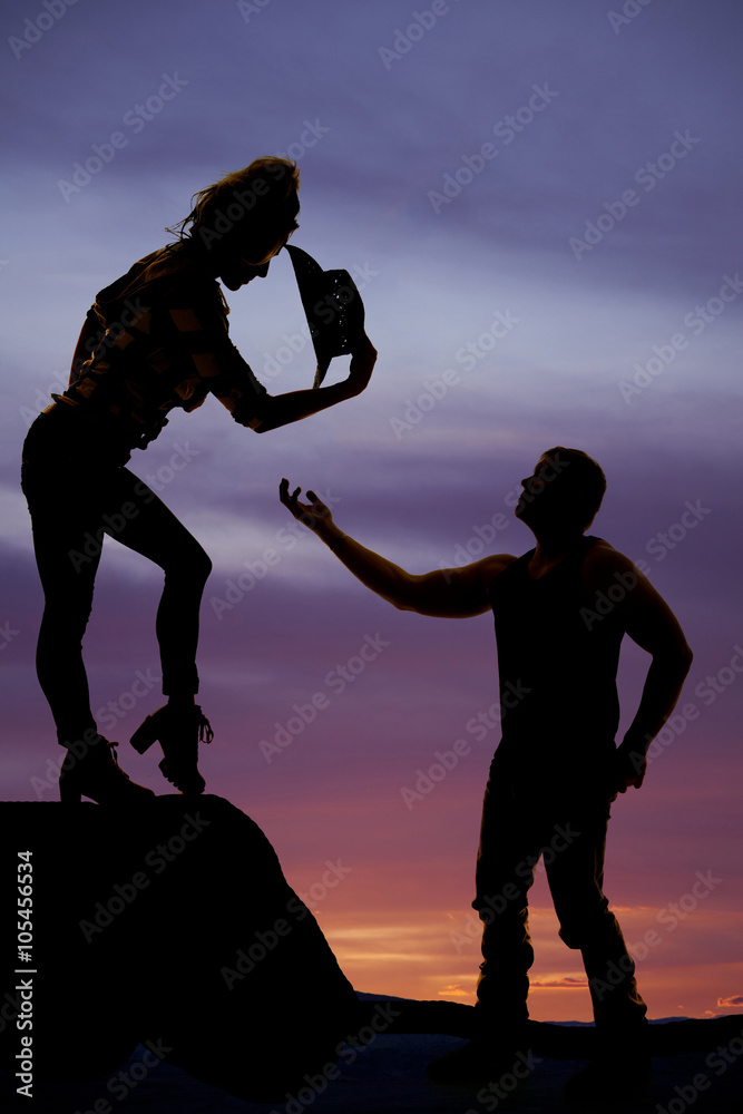 silhouette of man hand reaching up to a woman Stock Photo | Adobe Stock