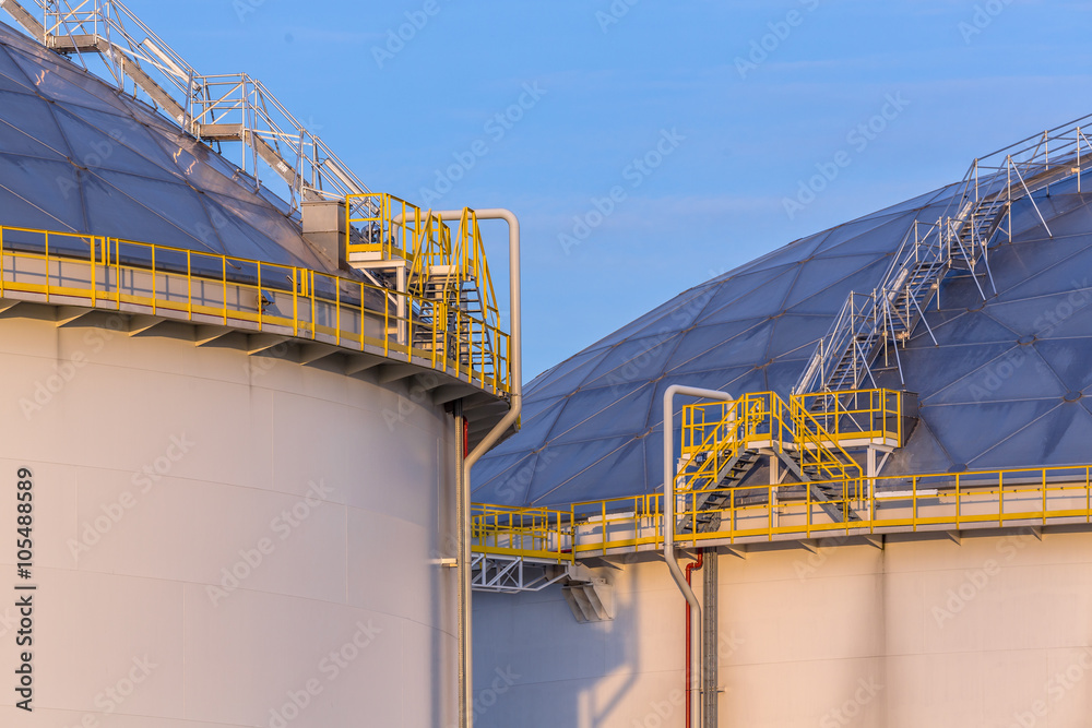 Modern oil storage tanks with Detail of steps and stairs Stock Photo ...