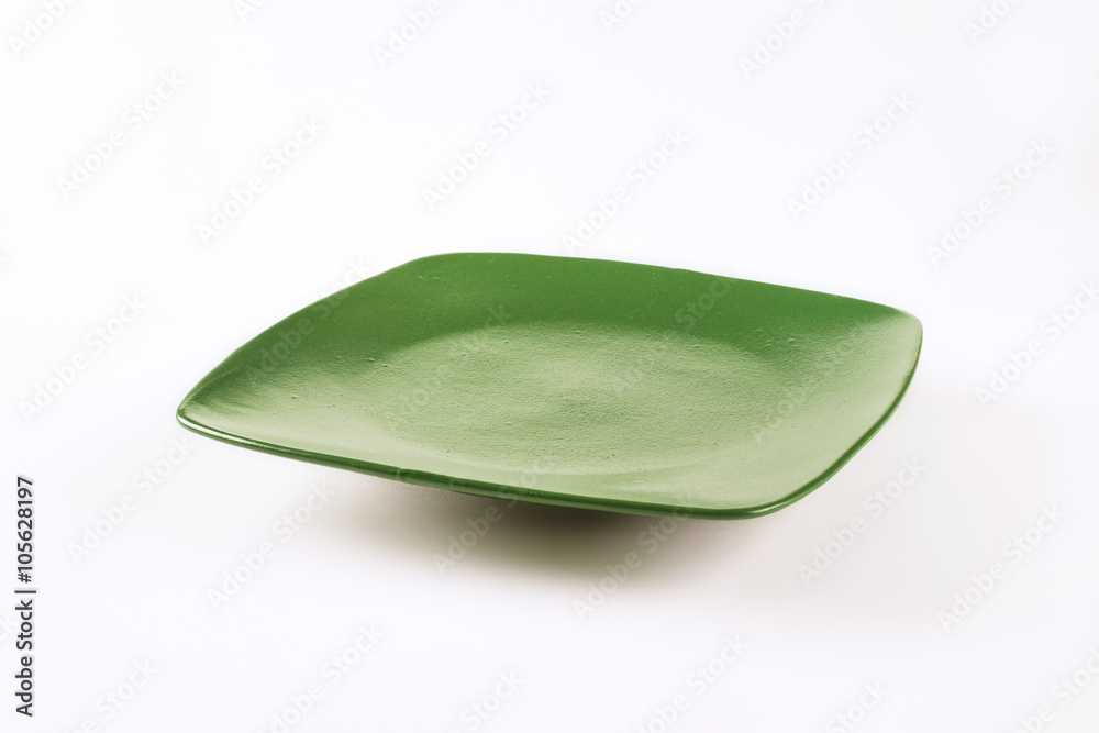 green dinner plate Stock Photo | Adobe Stock