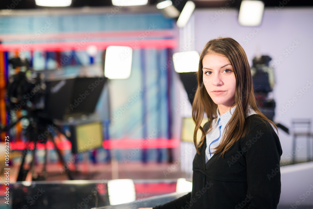 Television presenter recording in news studio.Female journalist anchor ...