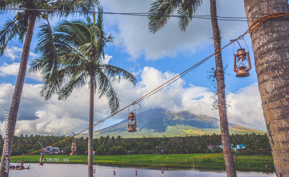 Vintage oil or kerosene lamps or lampads or lantern hanging on a rope ...