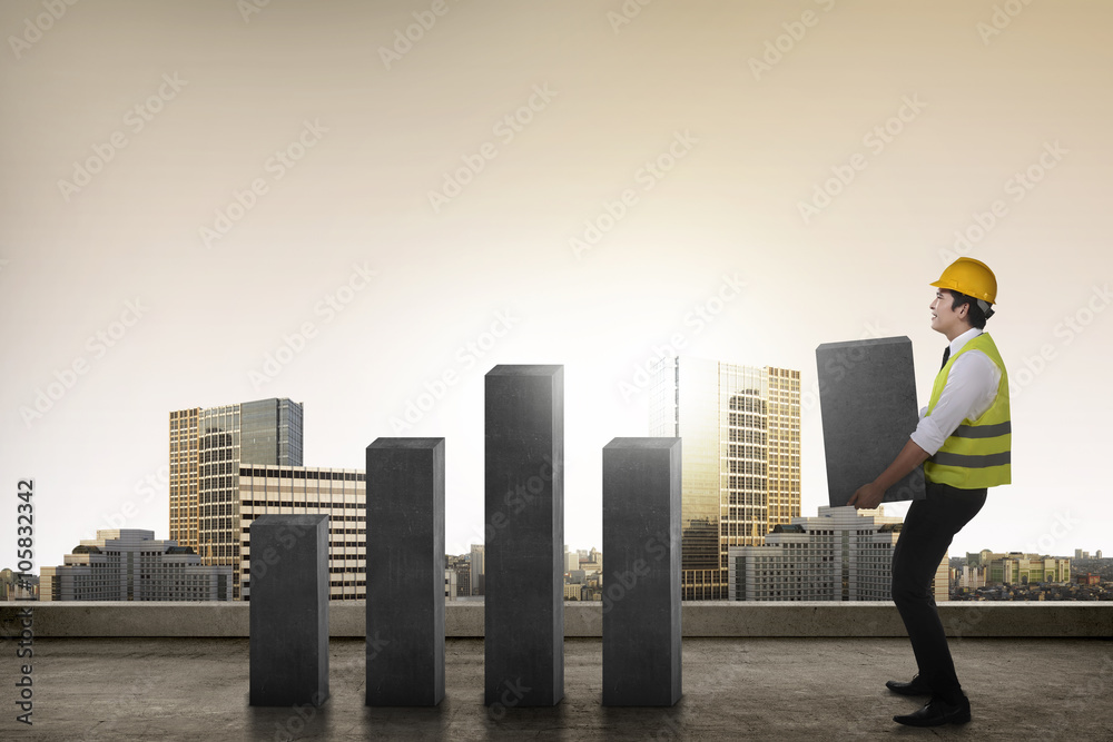 Asian worker lifting heavy block chart Stock Photo | Adobe Stock