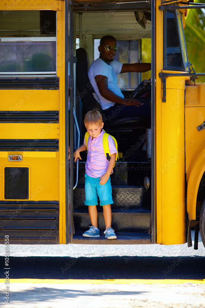 cute kid are getting off the bus, after school Stock Photo | Adobe Stock