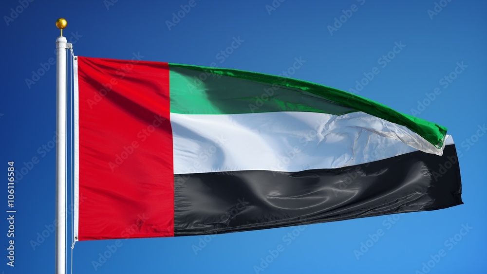 Emirates flag waving in slow motion against clean blue sky, seamlessly ...