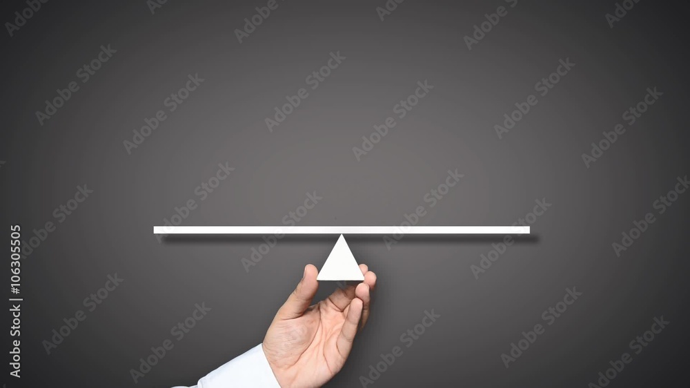 Gender equality concept. Hand holding balance with male and female ...