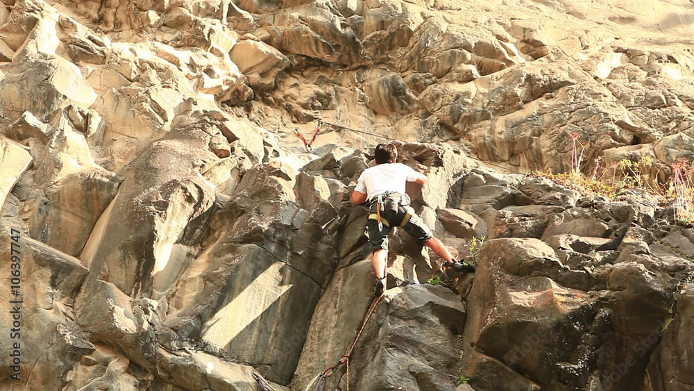Experience the thrill of rock climbing on a perfect vertical wall ...