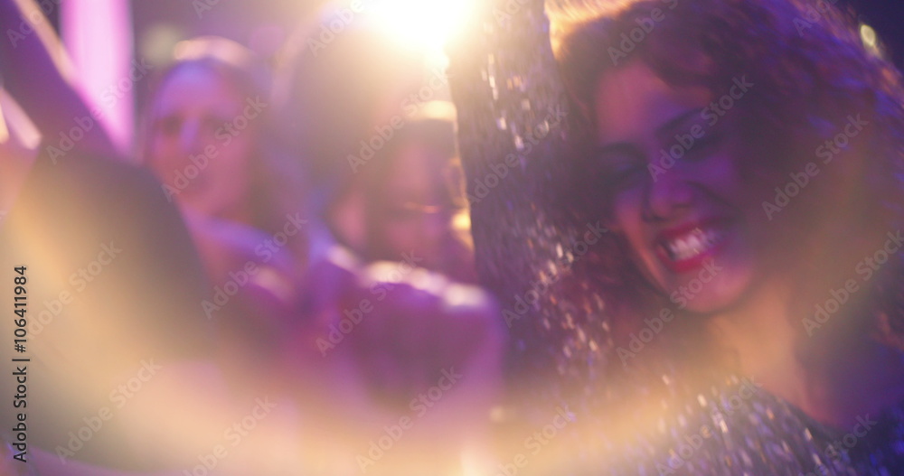 Middle eastern woman dancing and laughing at party in nightclub Stock ...
