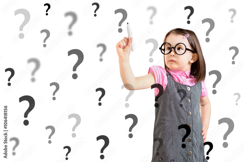Cute little girl wearing business dress and writing question mark ...