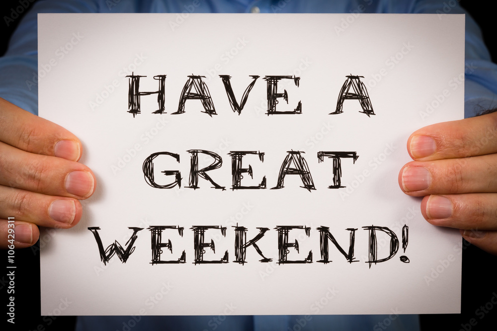 Man with Have a Great Weekend sign Stock Photo | Adobe Stock