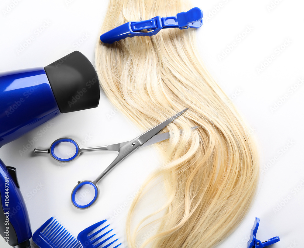 Barber set with strand of hair, tools and equipment, isolated on white ...