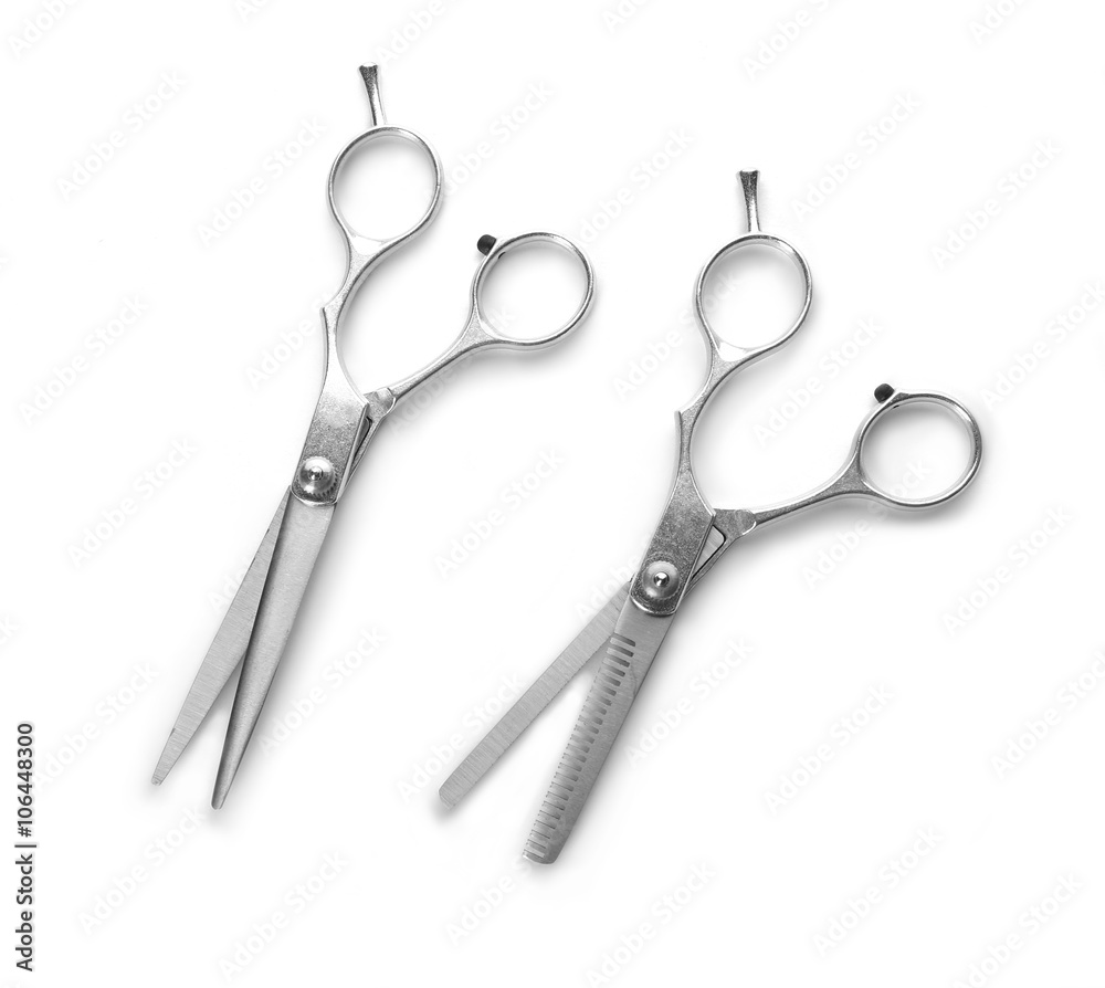 Two professional metal scissors in open positions isolated on white ...