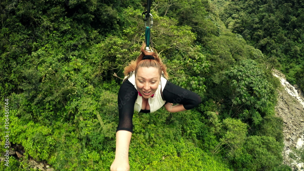 tourist woman on zipline superman style tour run zipline canopi courage ...