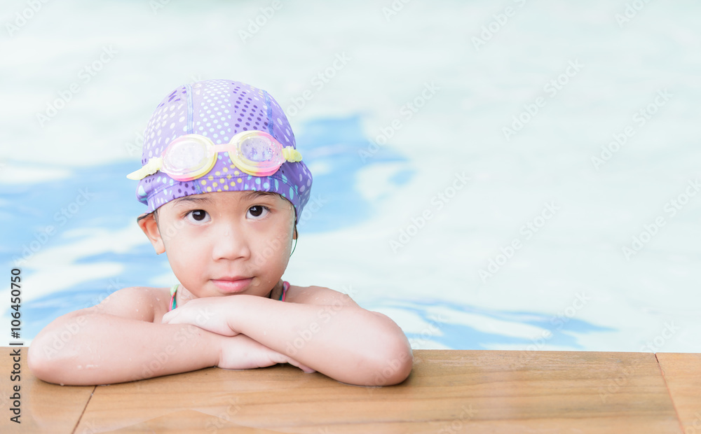 cute girl in swimming pool Stock Photo | Adobe Stock