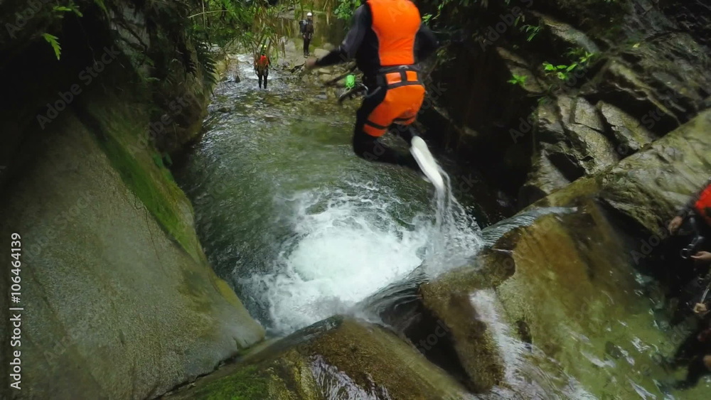 Experience the thrill as a tourist fearlessly dives into a breathtaking ...