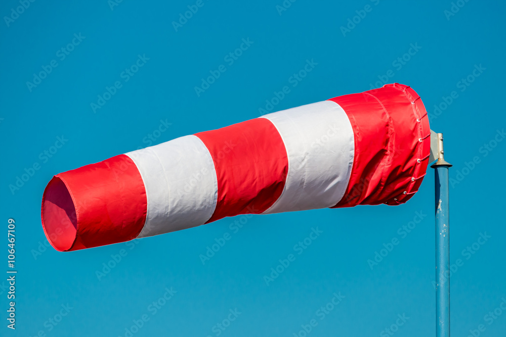 Windsack vor blauem Himmel Stock-Foto | Adobe Stock