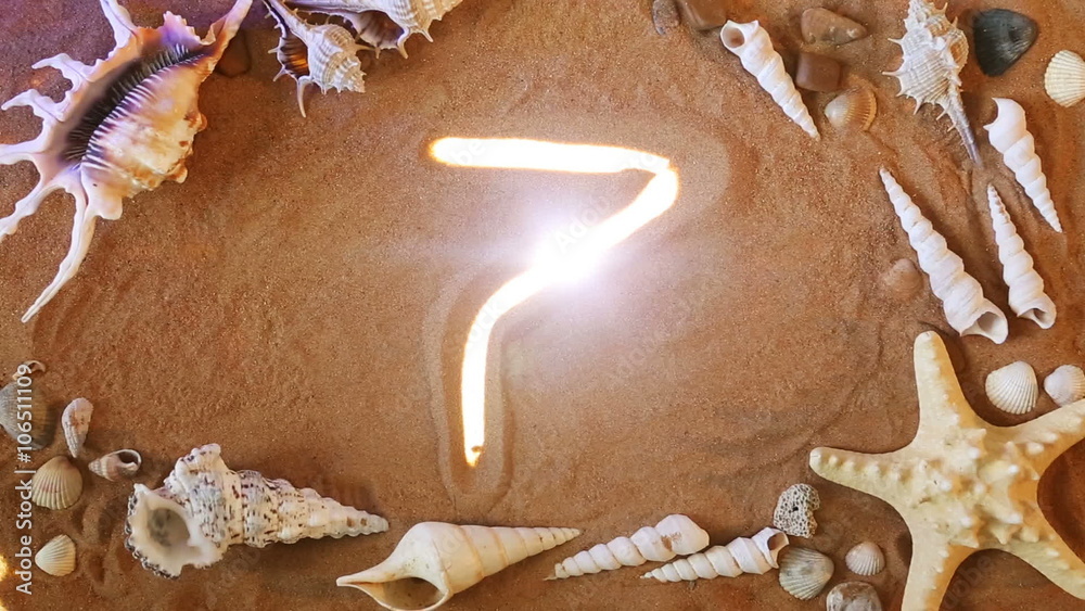 Hand drawing Number Seven 7 Symbol in the Sand. Beach background. Top ...