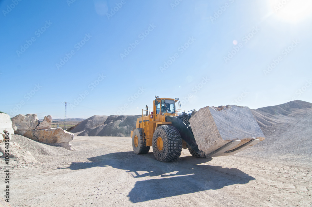 60-ton front end loader in marble quarry Stock Photo | Adobe Stock