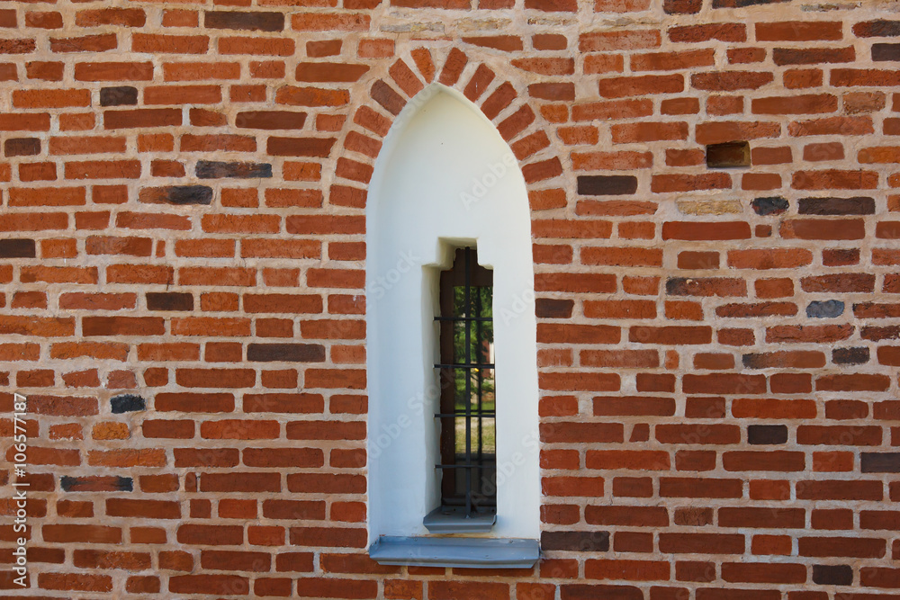 Ancient brick castle wall with window. Medieval buildings of ancient ...