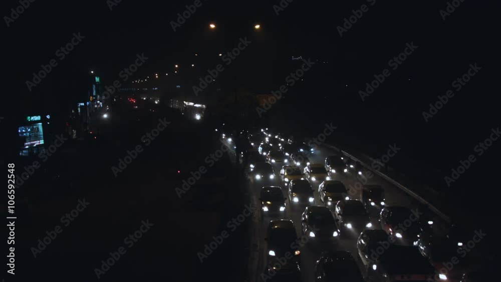 Time lapse shot of traffic on road in a city at night, Delhi, India ...