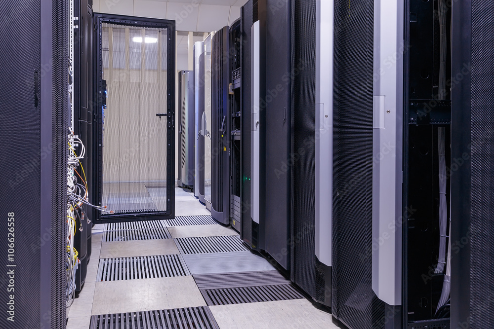 server room with rows of modern mainframes Stock Photo | Adobe Stock