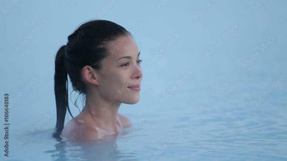 Hot spring pool - woman relaxing in geothermal spa on Iceland. Girl ...