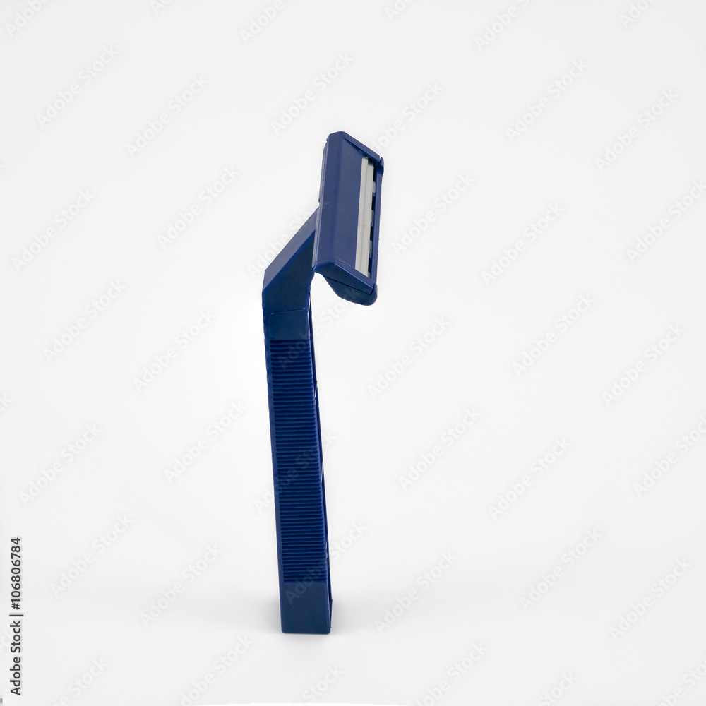 The close up of dark blue plastic razor for men. Stock Photo | Adobe Stock