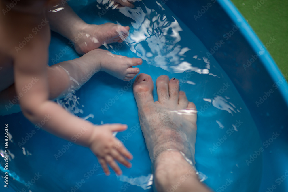 Baby feet in bath tub Stock Photo | Adobe Stock