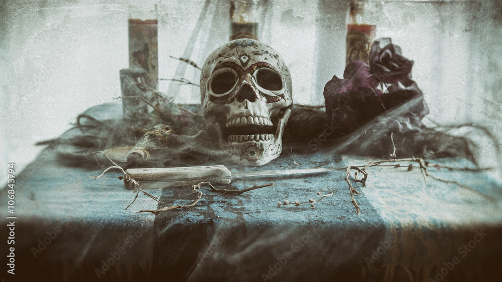 Voodoo Mist Skull Ritual. Voodoo related objects on a table including a ...