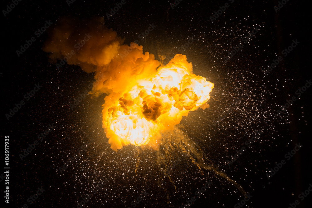 Realistic fiery explosion over a black background Stock Photo | Adobe Stock
