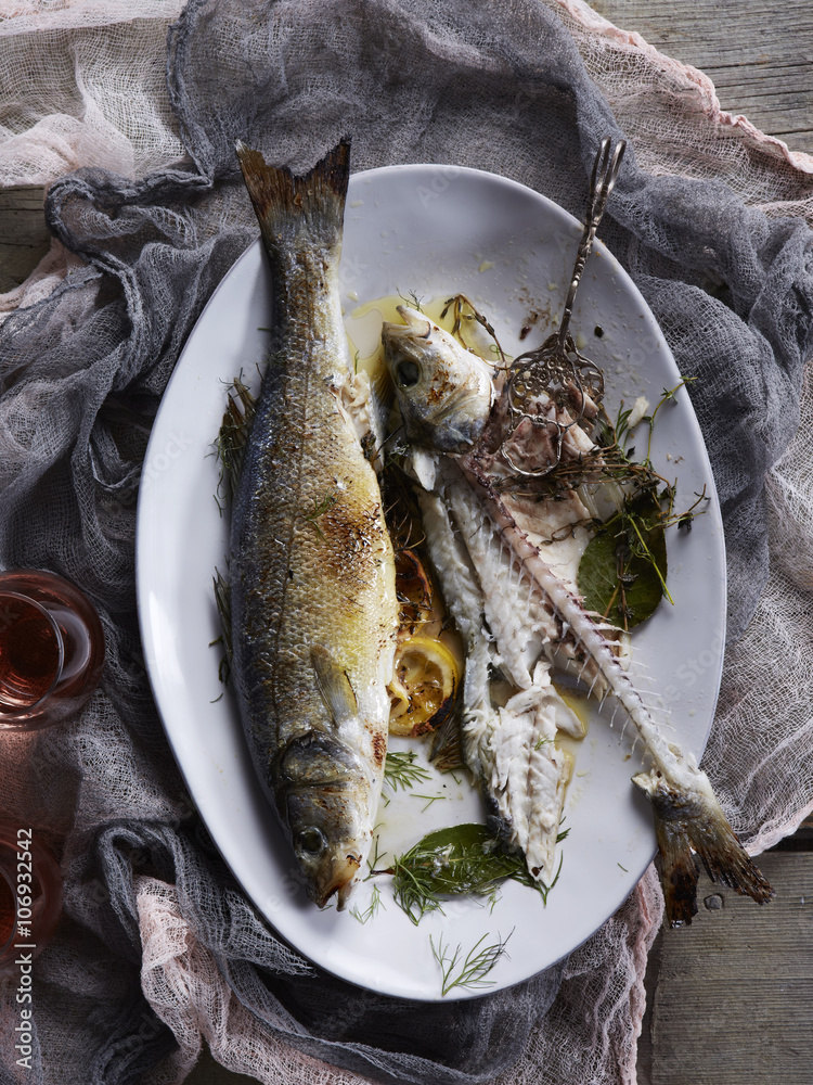 Still life with branzino fish and bones Stock Photo | Adobe Stock